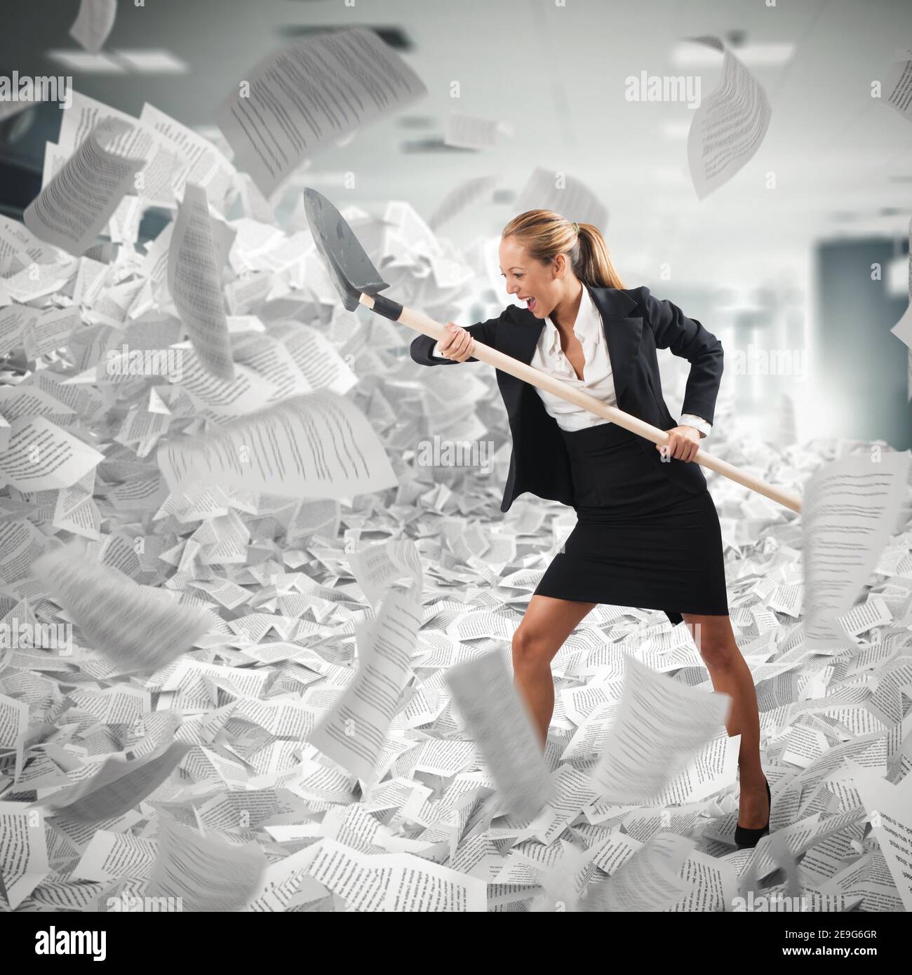 Woman surrounded by paperwork hi-res stock photography and images - Alamy