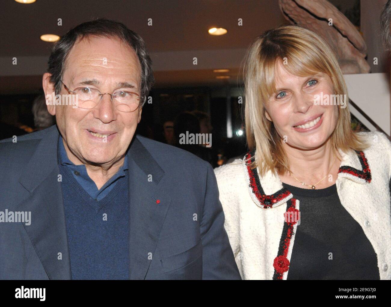 Director Robert Hossein and his wife Candice Patou pose at the opening ...