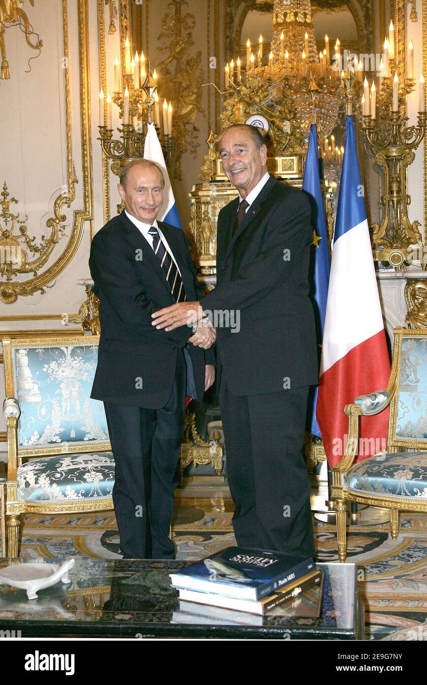 Russian President Vladimir Putin, and his French counterpart Jacques ...