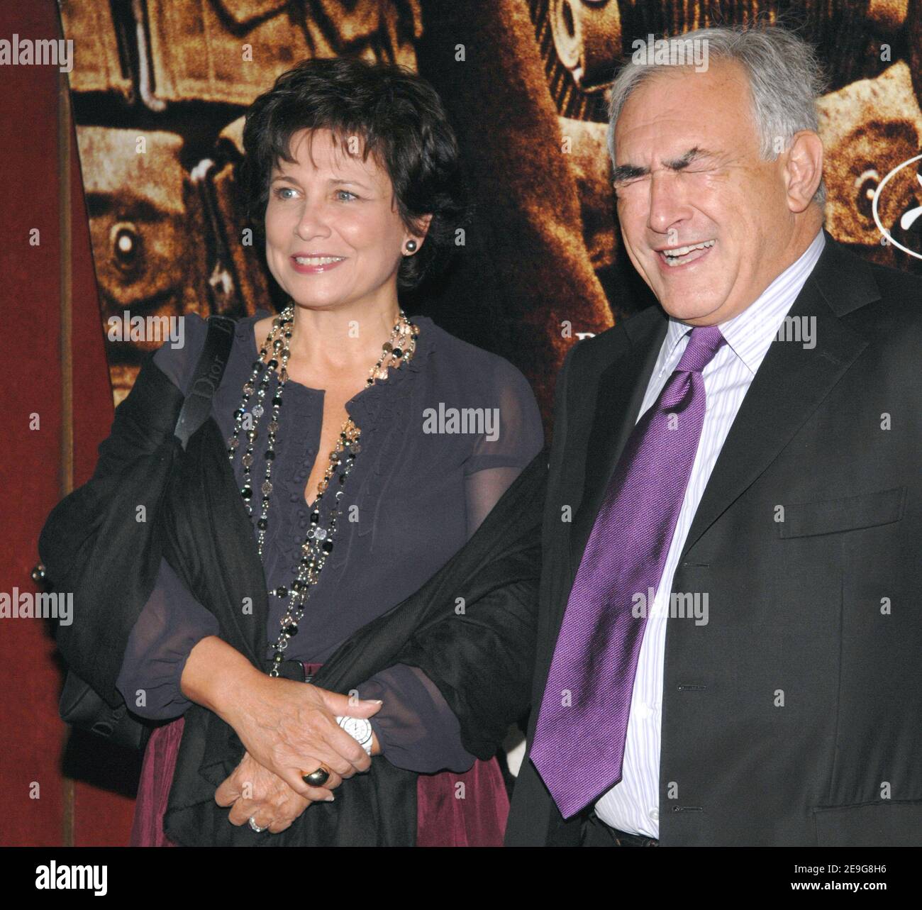 Dominique Strauss-Kahn and his wife Anne Sinclair pose for pictures as ...