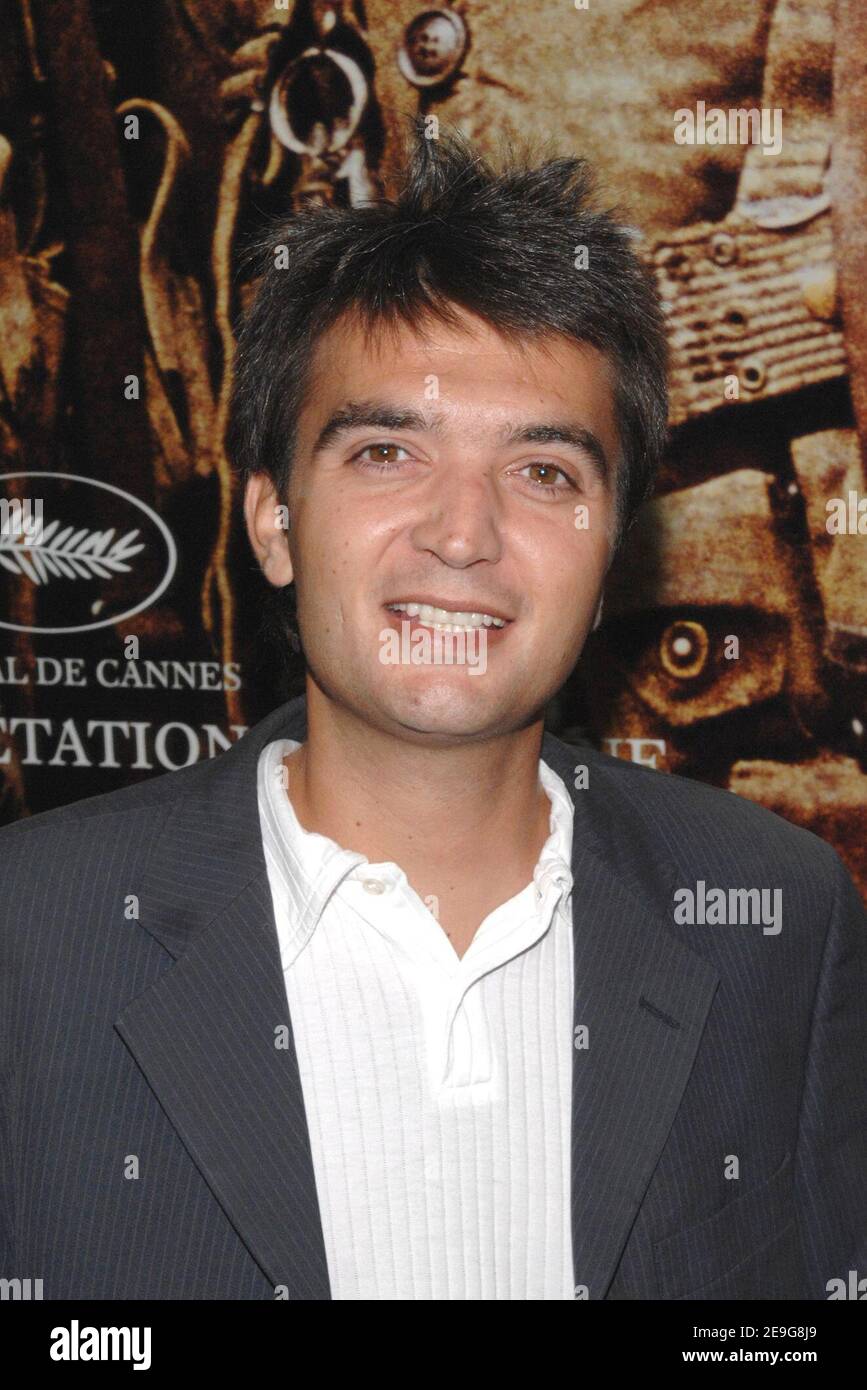 Cast member Thomas Langmann poses for pictures as he arrives to the ...