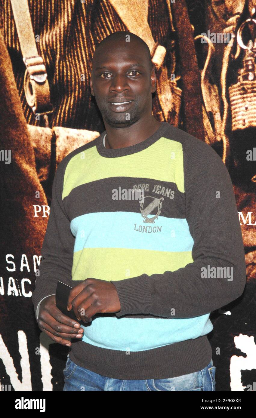 Comedian Omar poses for pictures as he arrives to the premiere of ...