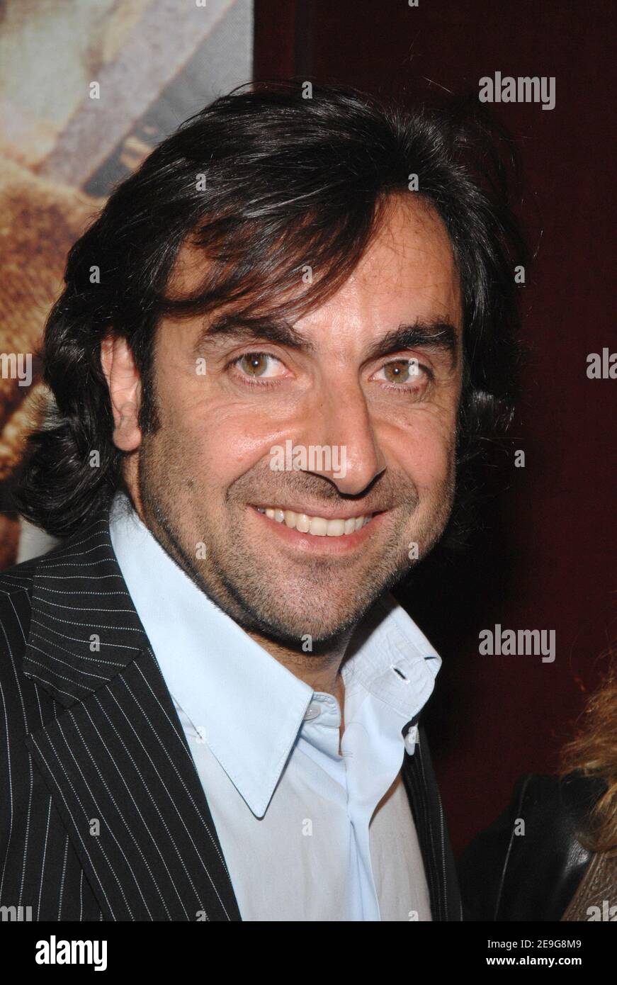 Andre Manoukian poses for pictures as he arrives to the premiere of ...