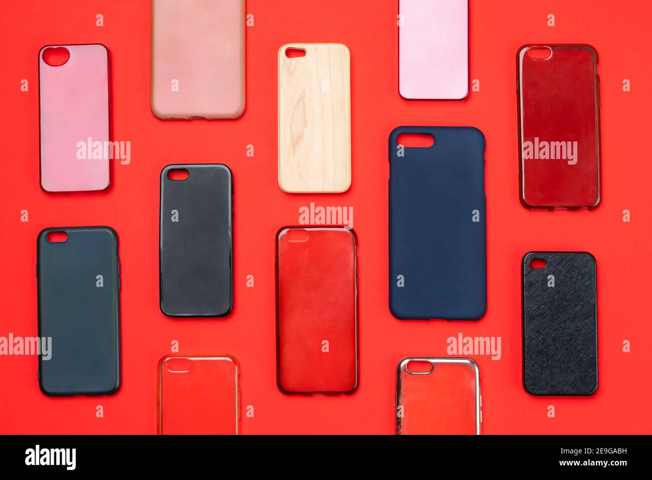 Pile of multicolored plastic back covers for mobile phone. Choice of ...
