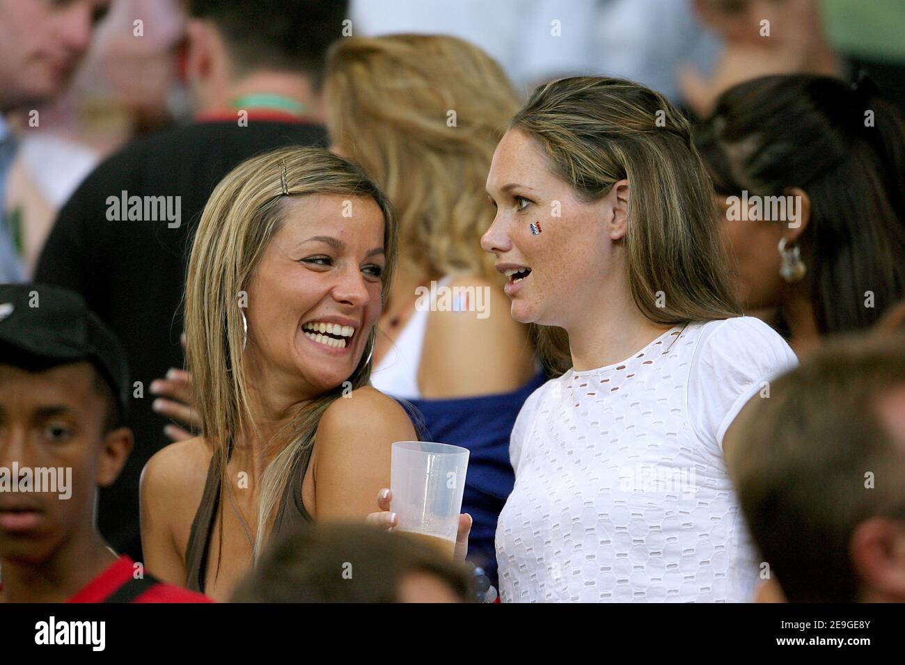Thierry Henry's wife, Nicole Merry (R) and David trezeguet's wife ...
