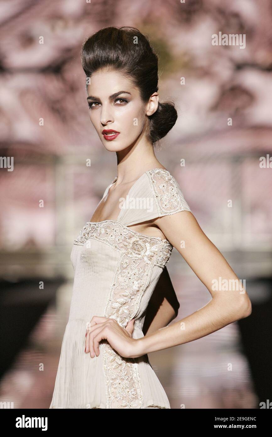 A model displays a creation by Italian fashion designer Valentino for ...