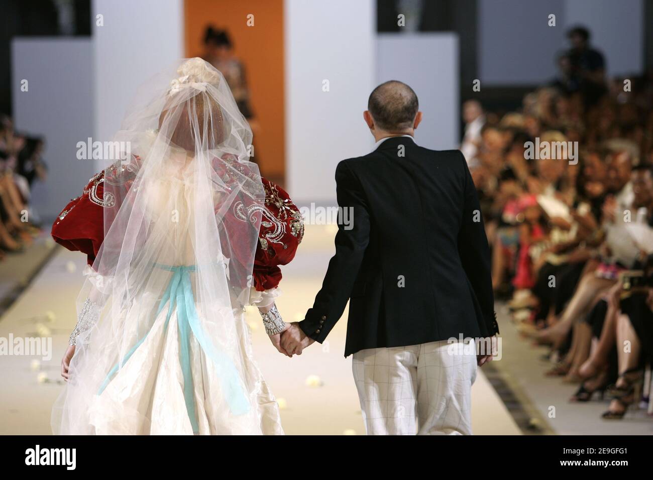 French designer Christian Lacroix with a model after the presentation ...