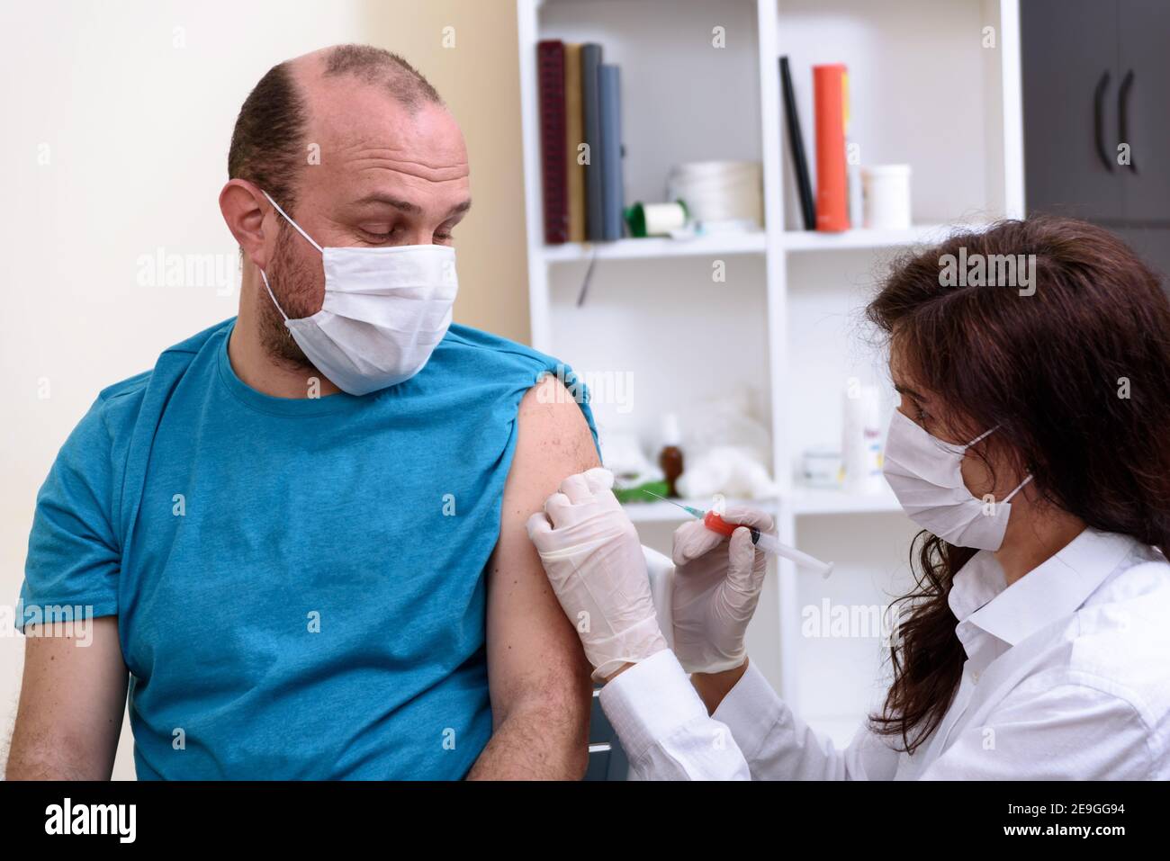 Injection arm mask hi-res stock photography and images - Alamy