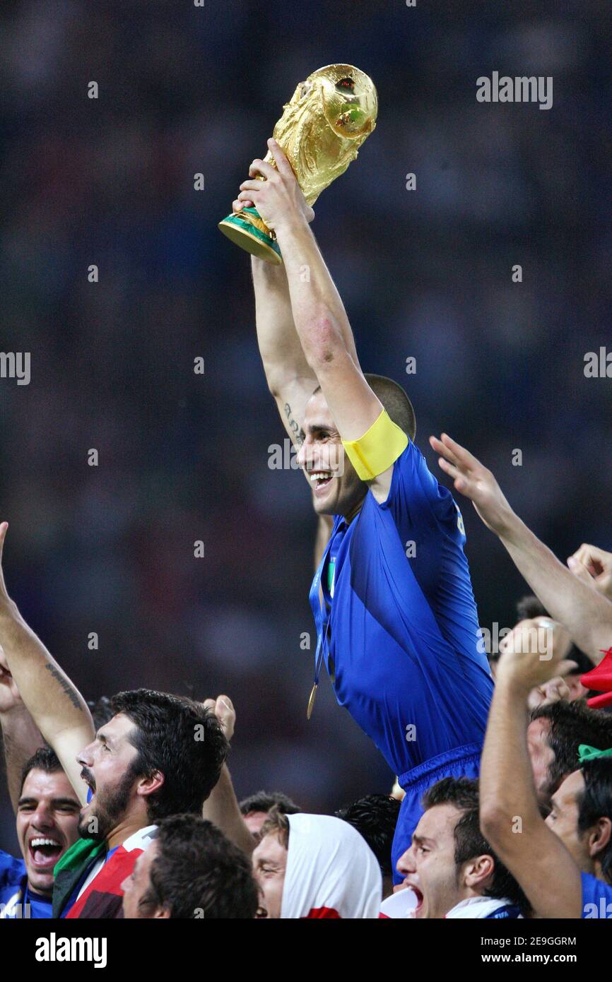 Italy captain Fabio Cannavaro lifts the trophy during the World Cup ...