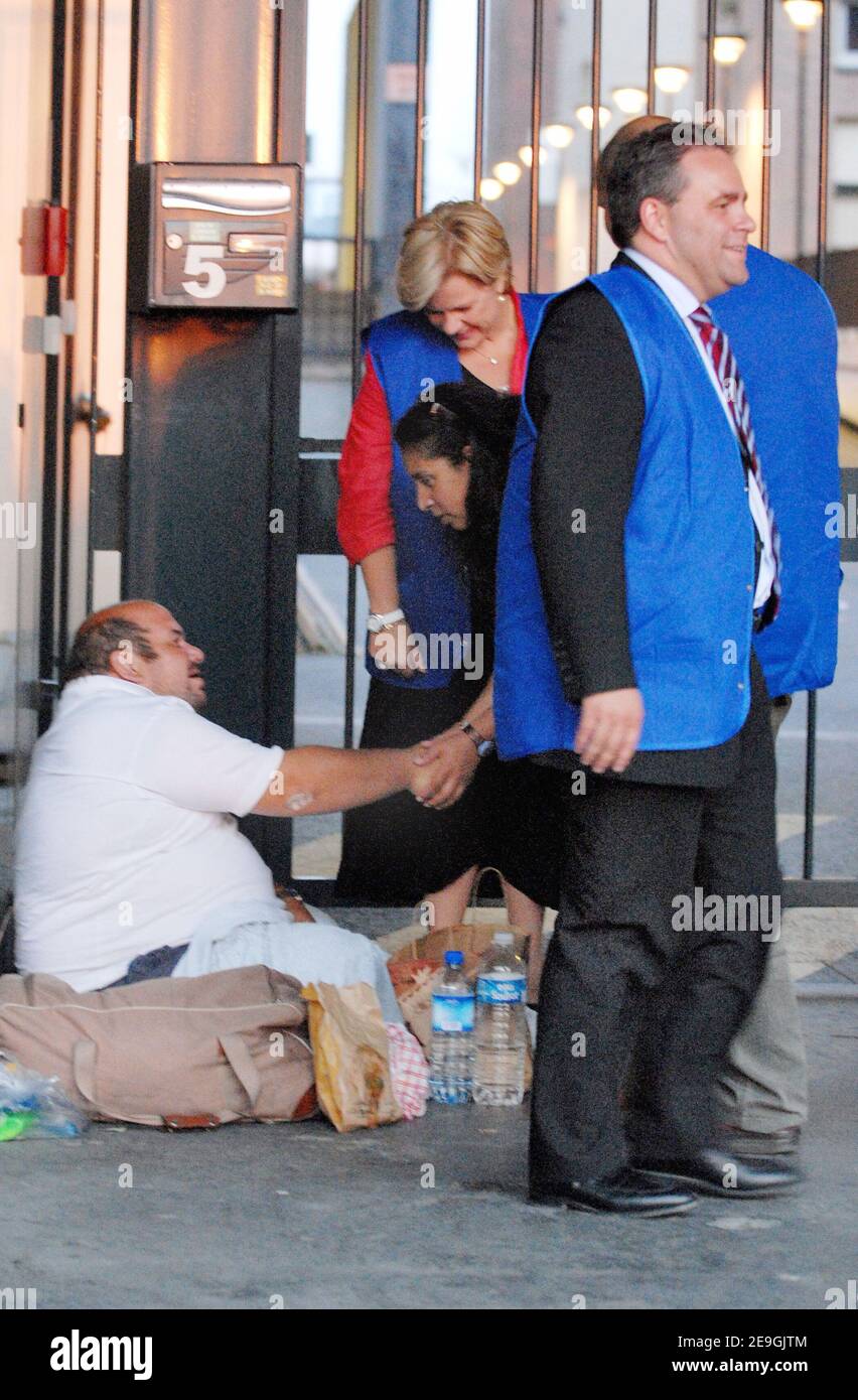 French Health minister Xavier Bertrand tours homeless shelters with ...