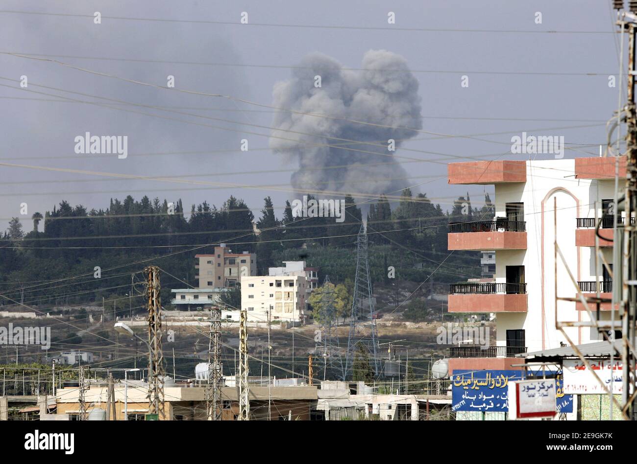 Smoke rises after the explosion of an Israeli airplane bomb strikes in ...