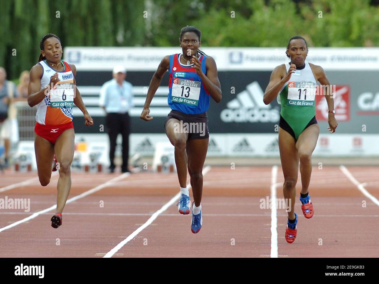 France's Muriel Hurtis competes and Sylviane Felix performs on women's ...