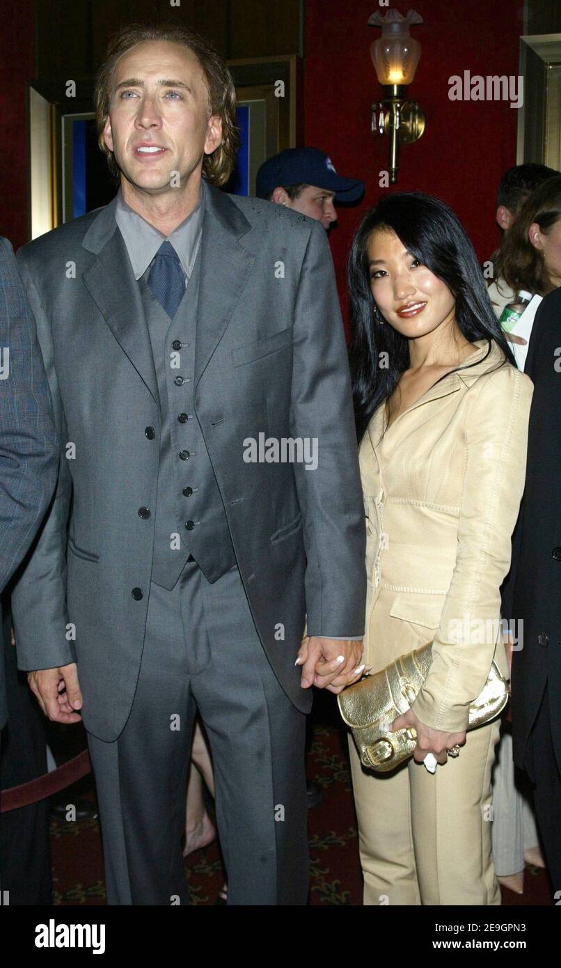 Nicolas Cage and Alice Kim arrive to the New York premiere of 'World ...