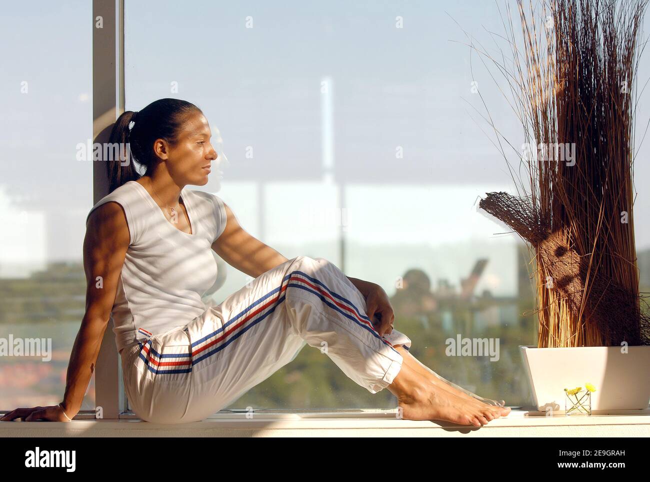 France's Carima Louami (100 meters) poses for our photographer before ...