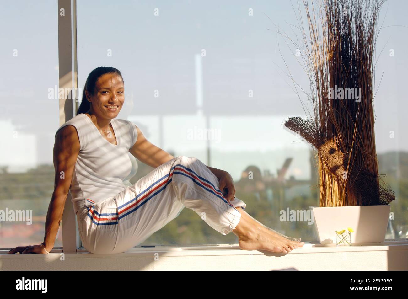 France's Carima Louami (100 meters) poses for our photographer before ...