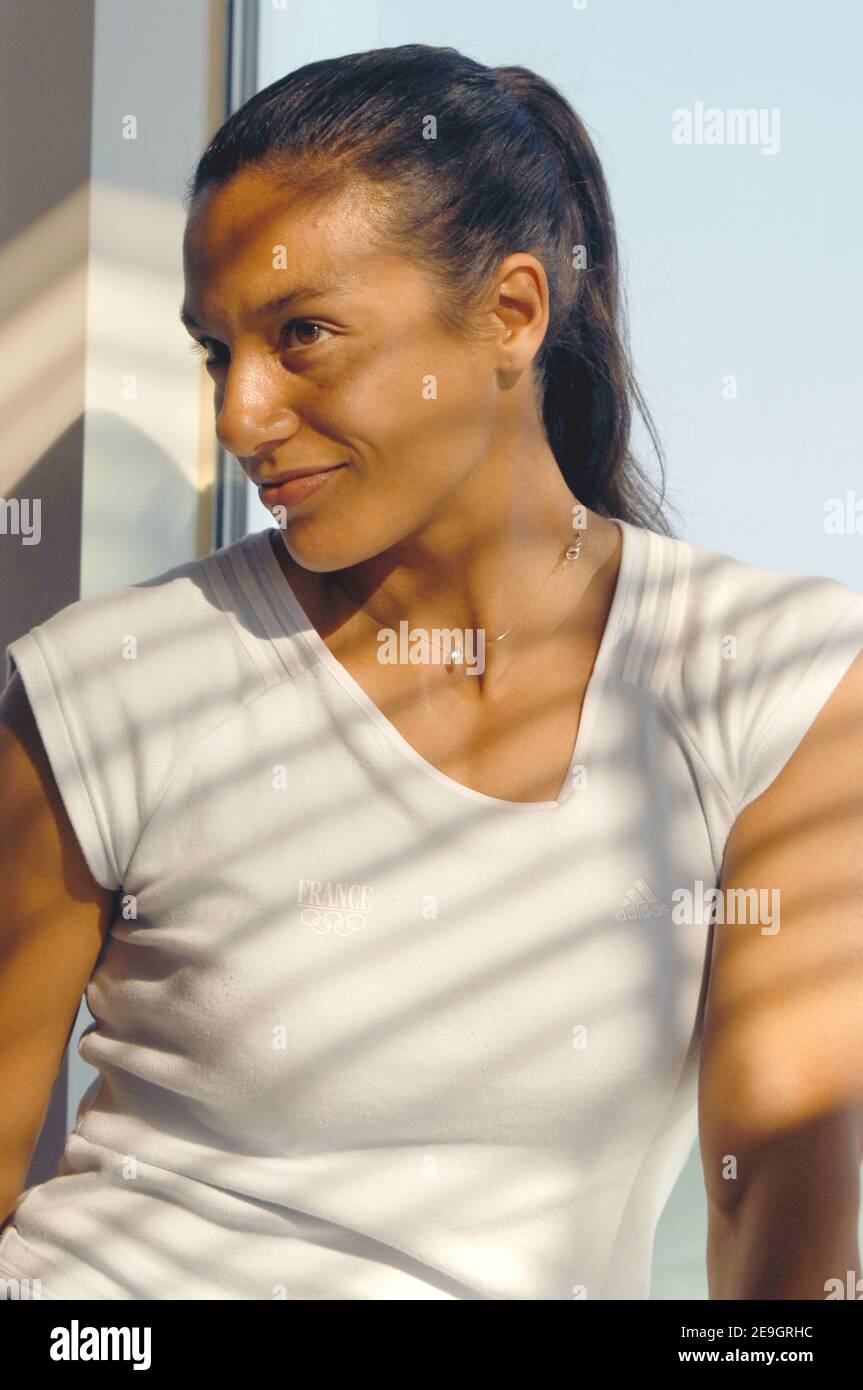 France's Carima Louami (100 meters) poses for our photographer before ...