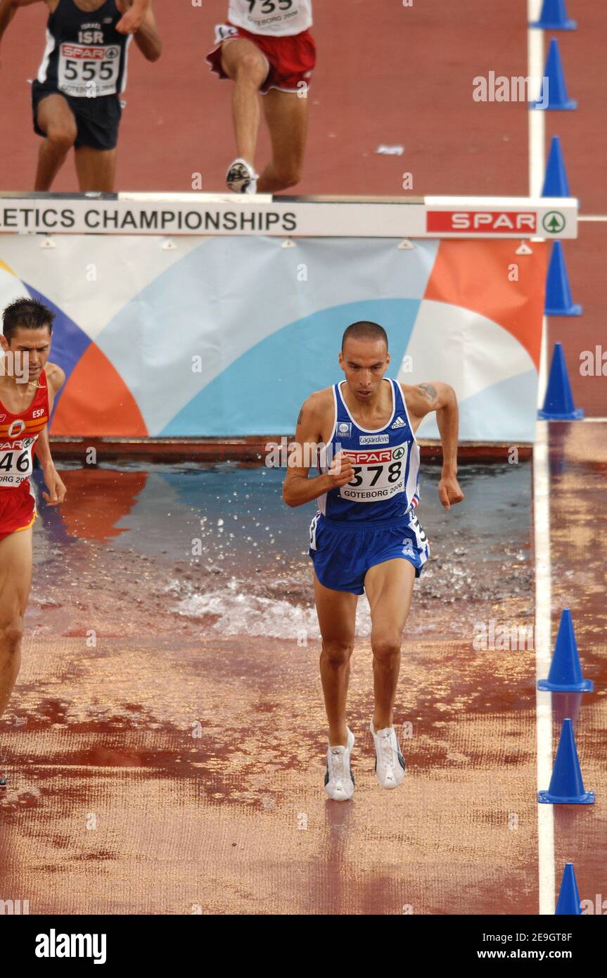 France's Bouabdellah Tahri competes at the waterjump on 3000 ...