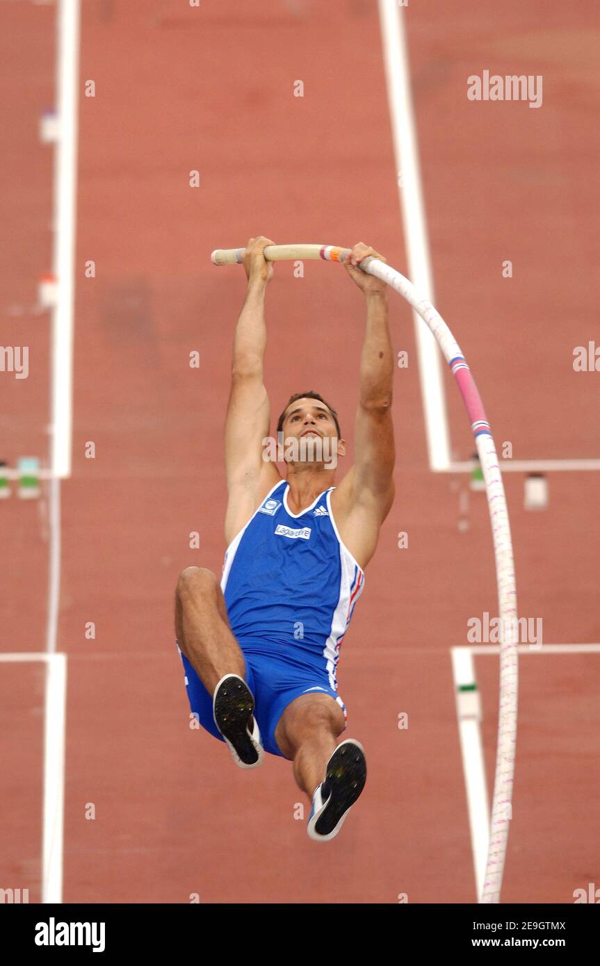 France's Romain Mesnil competes on pole vault qualification during the ...