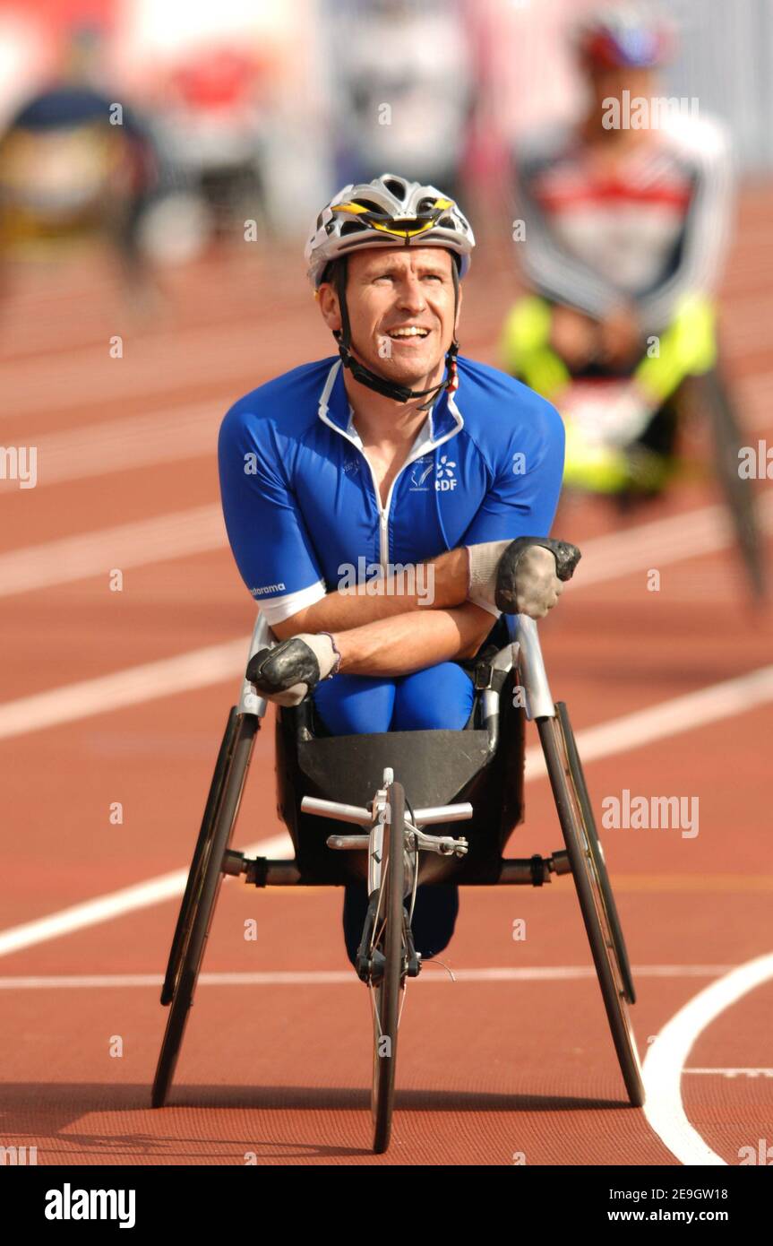 France's Alain Fuss and Eric Teurnier compete on 1500 meters wheelchair ...