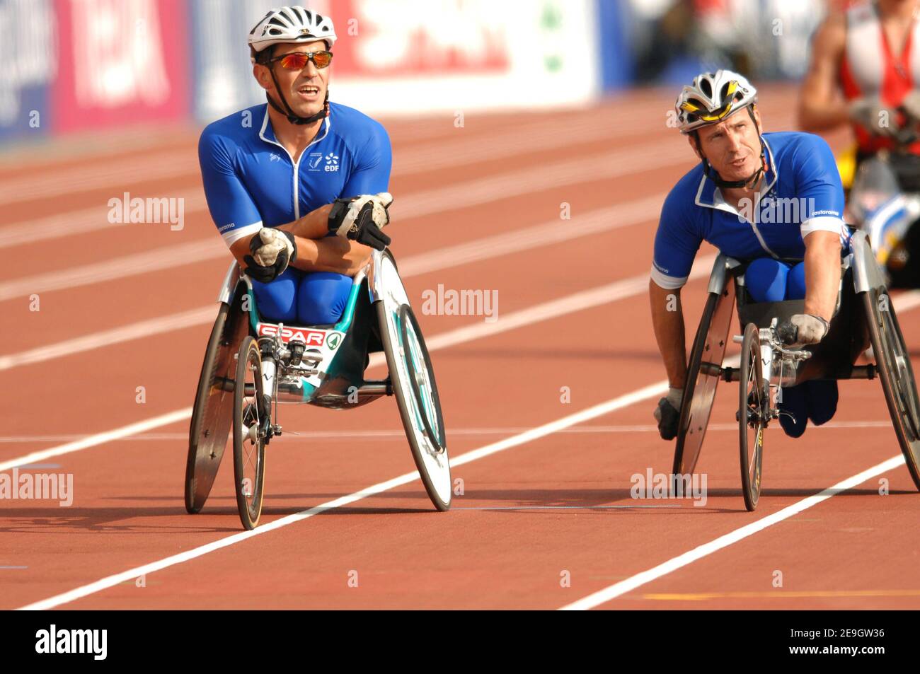 France's Alain Fuss and Eric Teurnier compete on 1500 meters wheelchair ...
