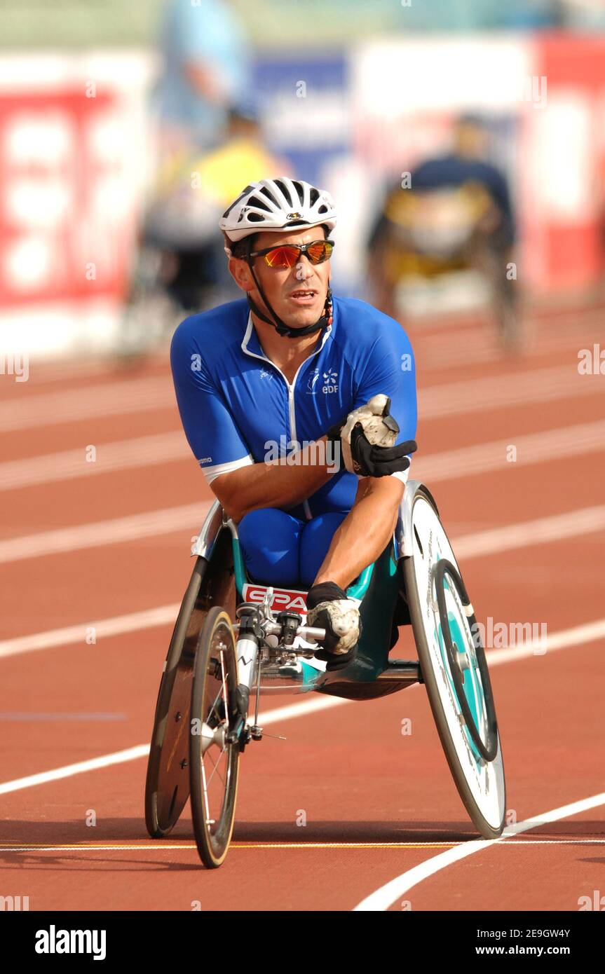 France's Alain Fuss and Eric Teurnier compete on 1500 meters wheelchair ...