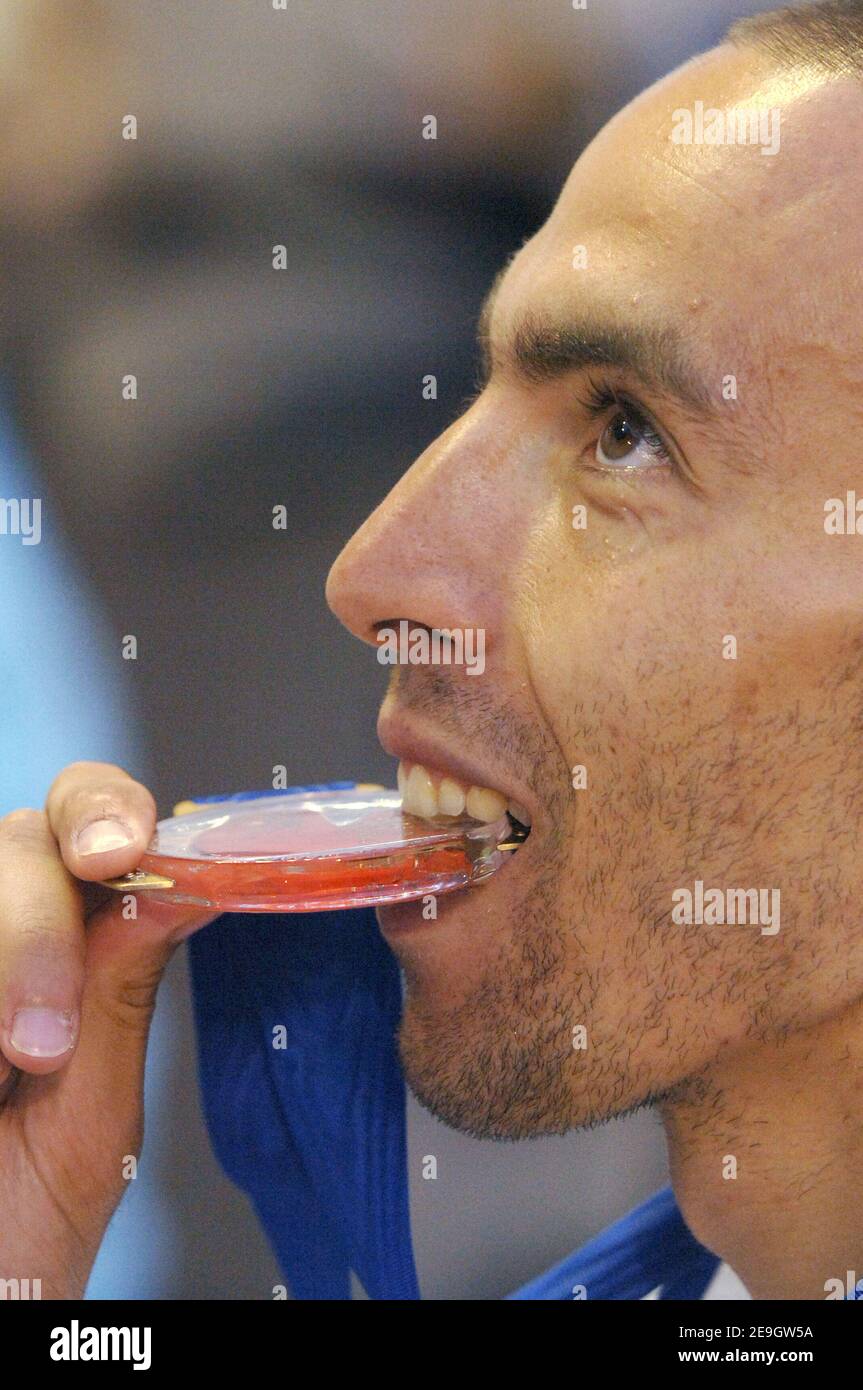 France's Bouabdellah Tahri poses with his bronze medal medal on 3000 ...