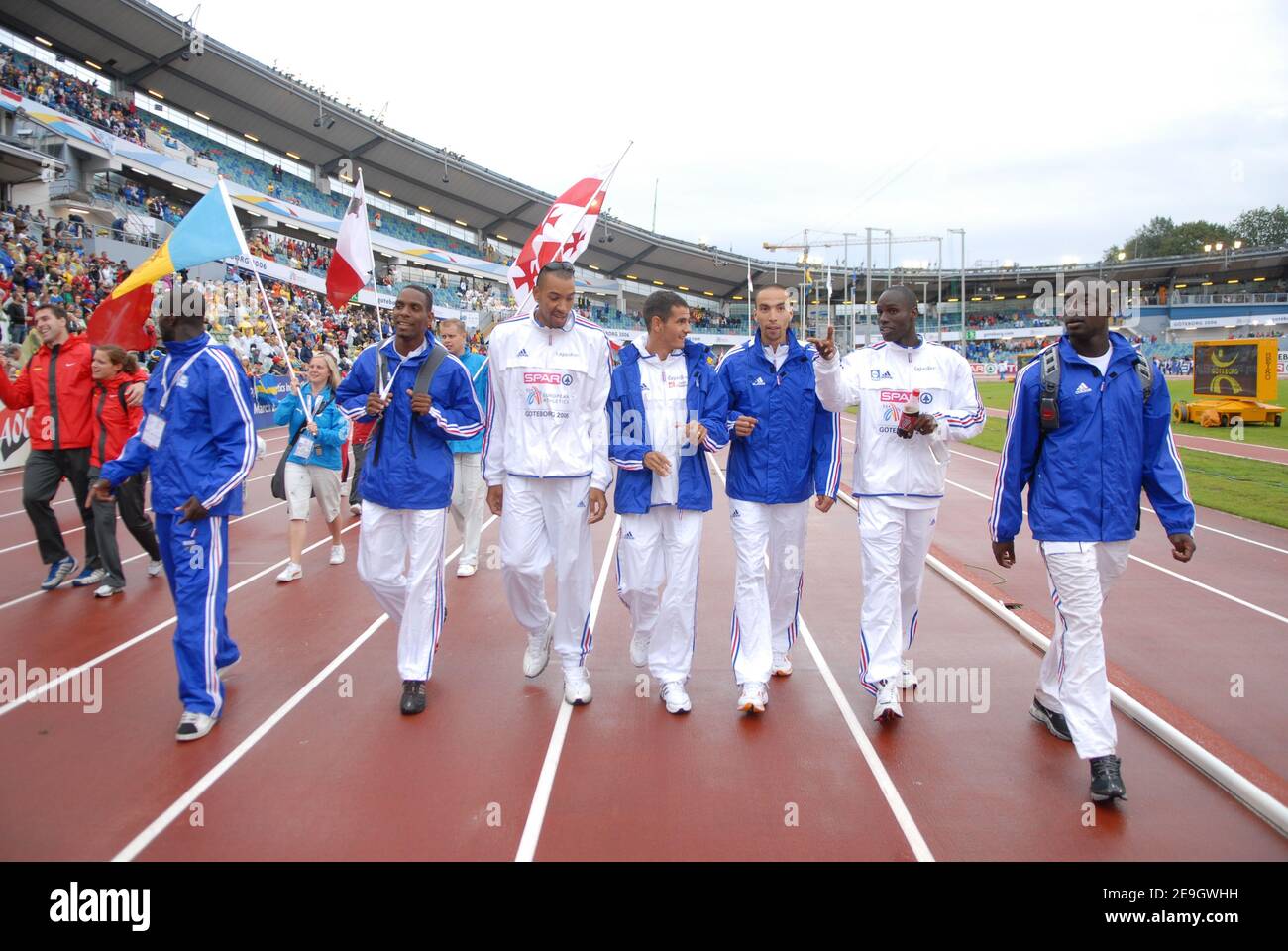 The French Athletics team poses during the closing ceremony at the ...