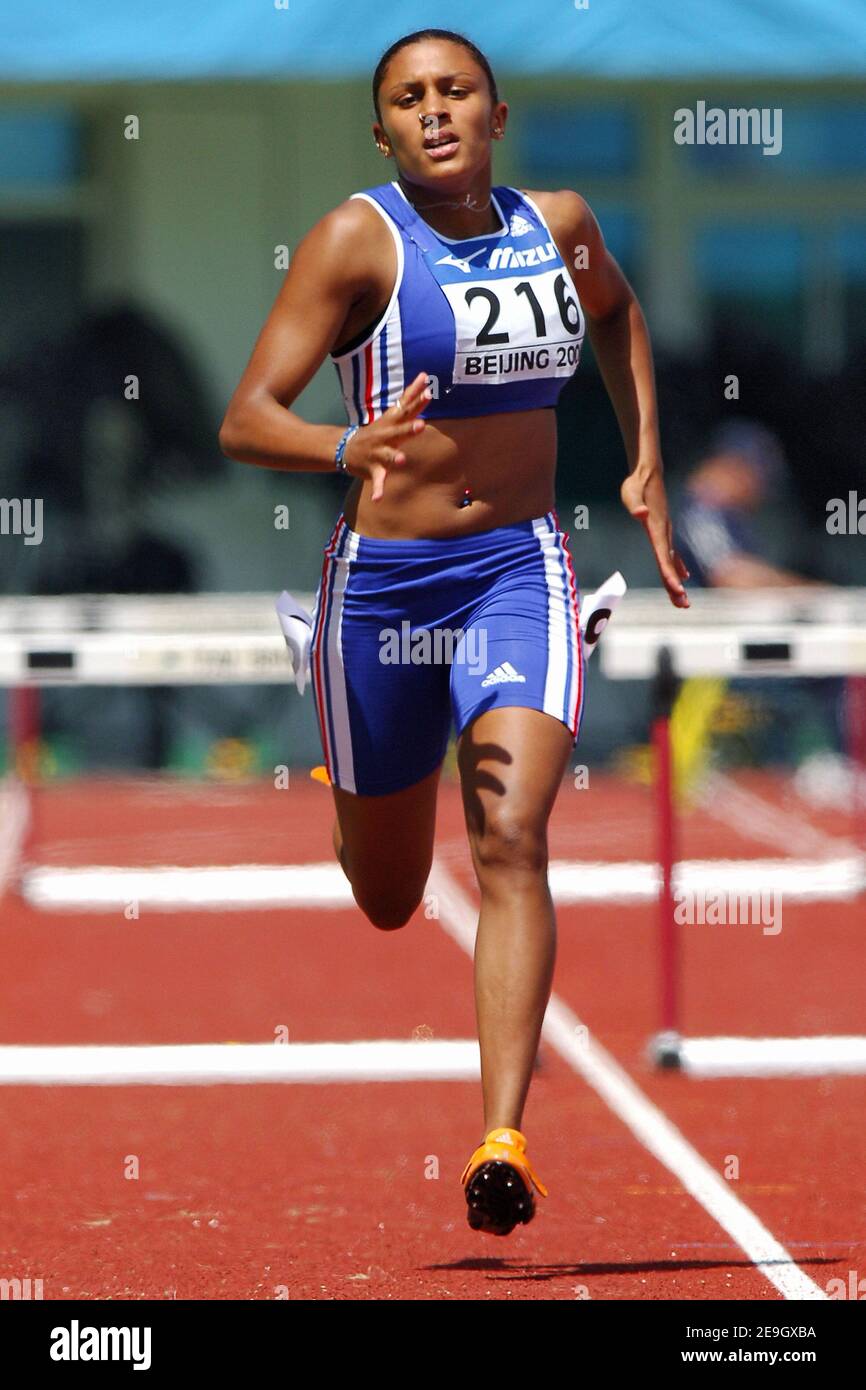 France's Laetitia Denis competes on women's 400 meters hurdles heat ...