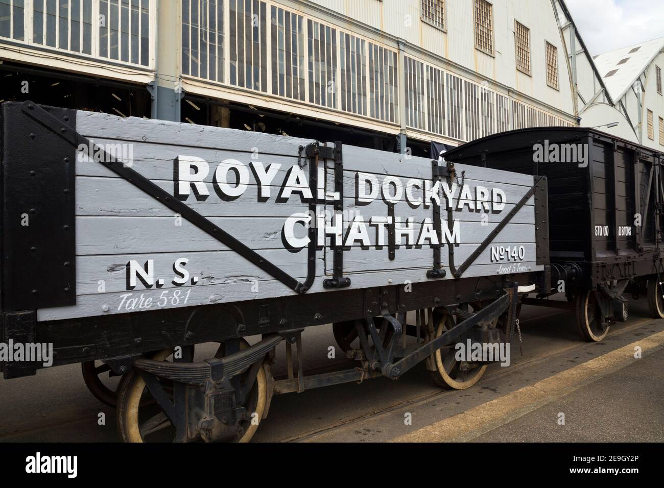 Goods train wagons / carriages being shunted by World War II era diesel ...