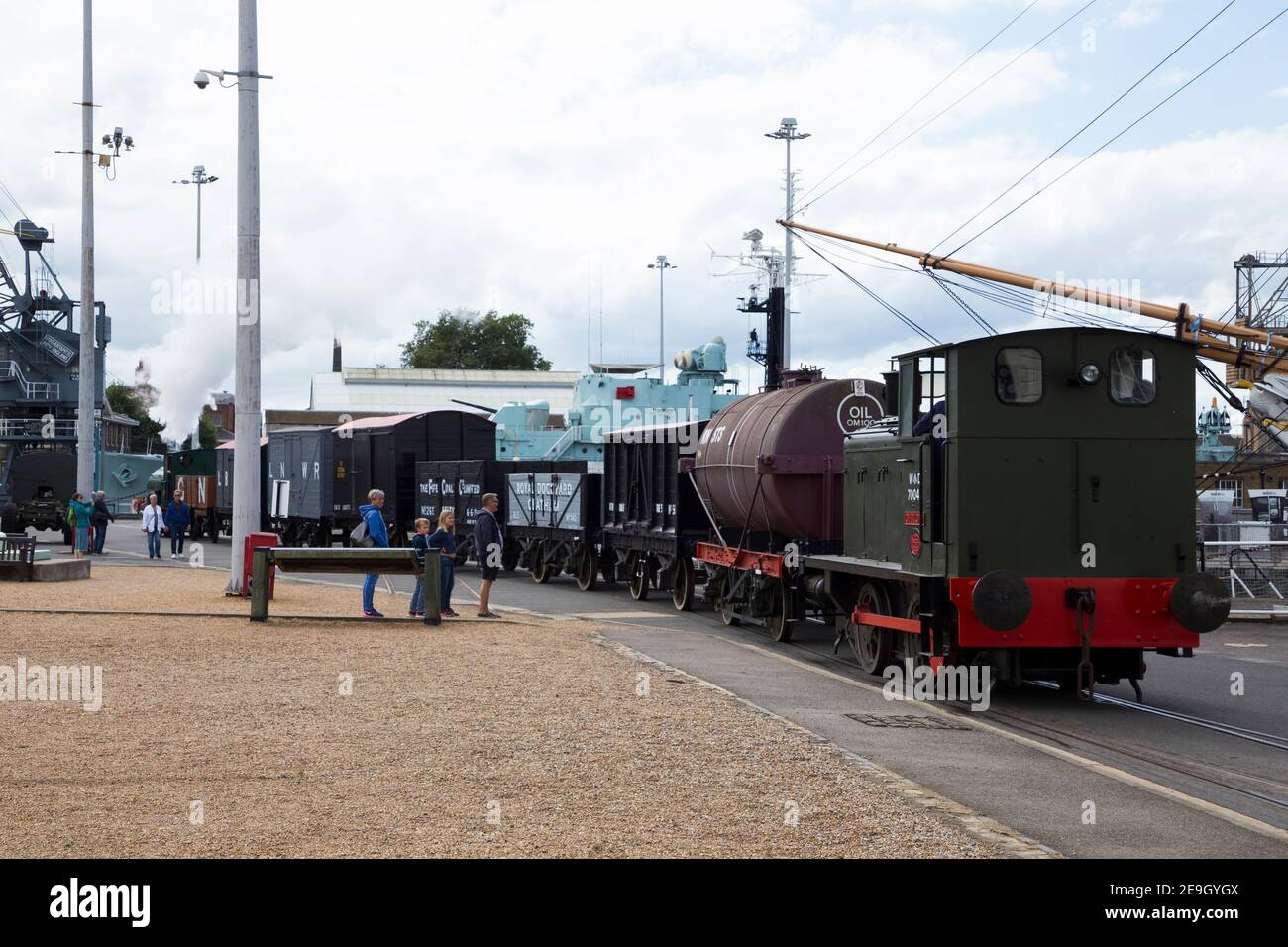 Goods train wagons / carriages being shunted by World War II era diesel ...