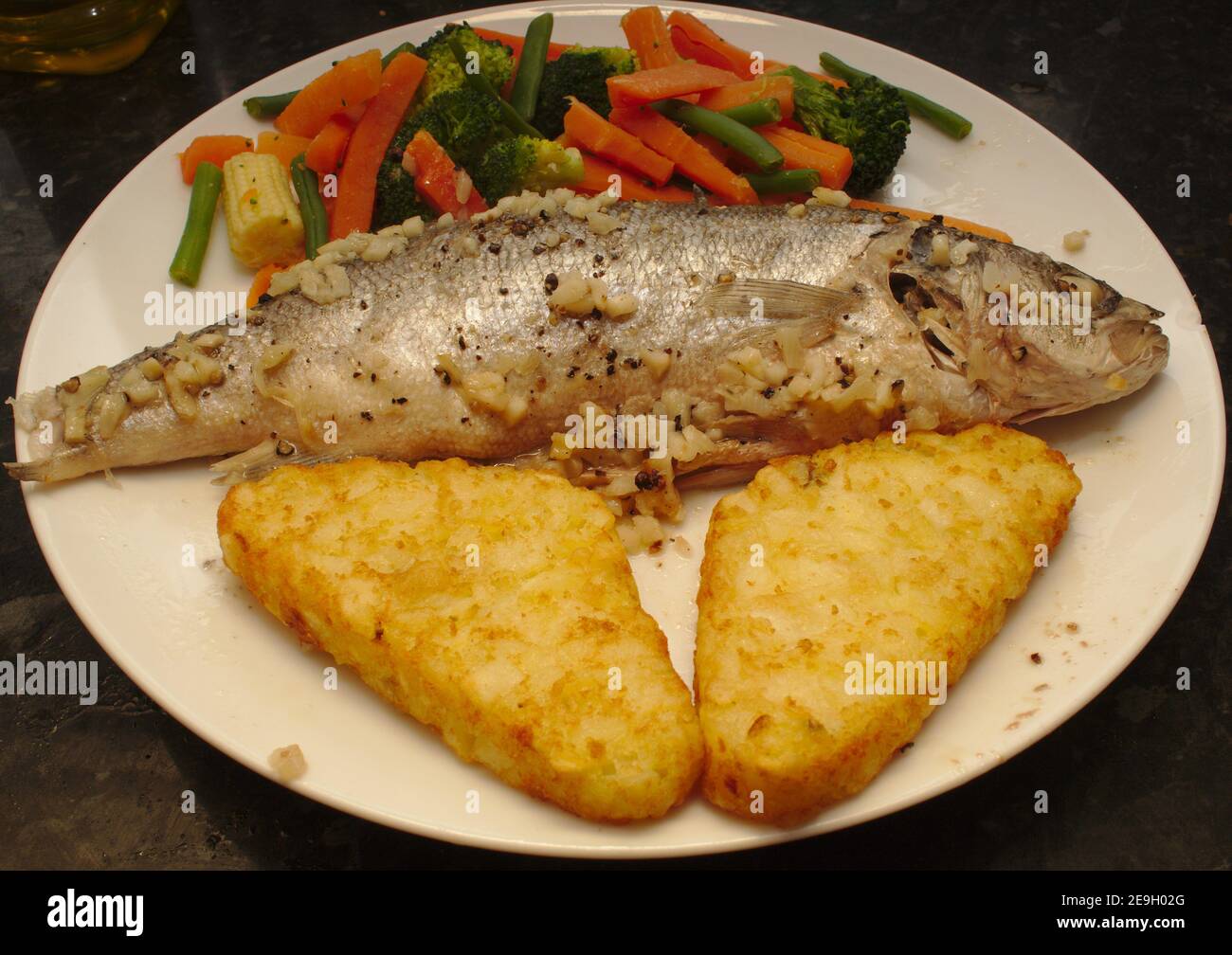 Fish and hash browns Stock Photo - Alamy
