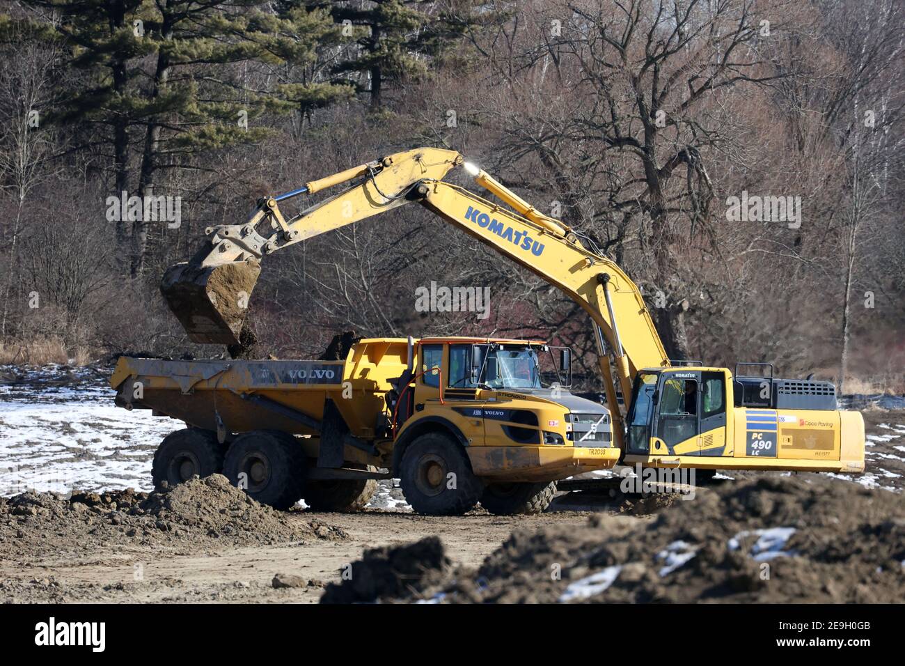 Winter Construction project moving earth Stock Photo - Alamy