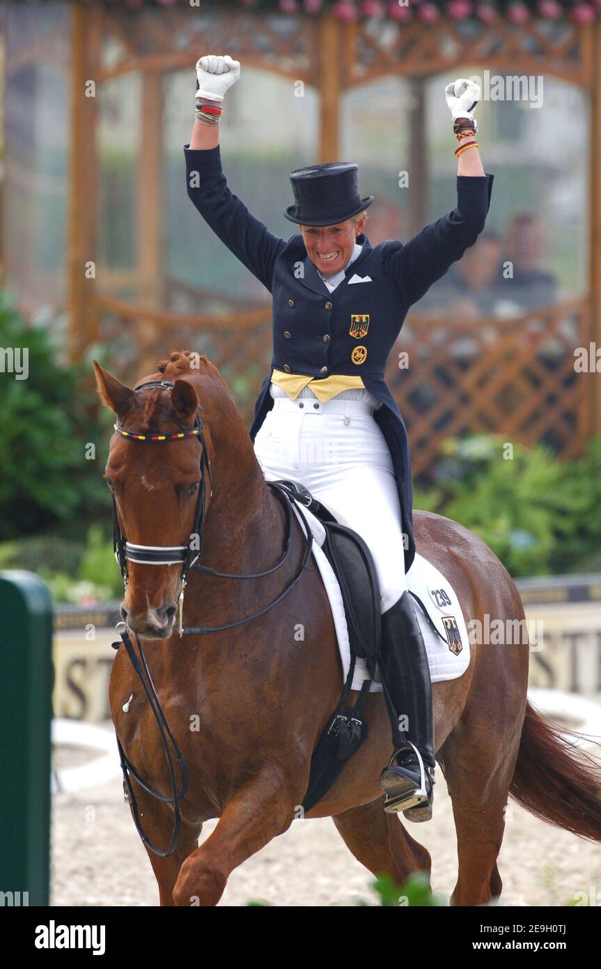 German dressage rider Heike Kemmer celebrates on her horse 'Bonaparte ...