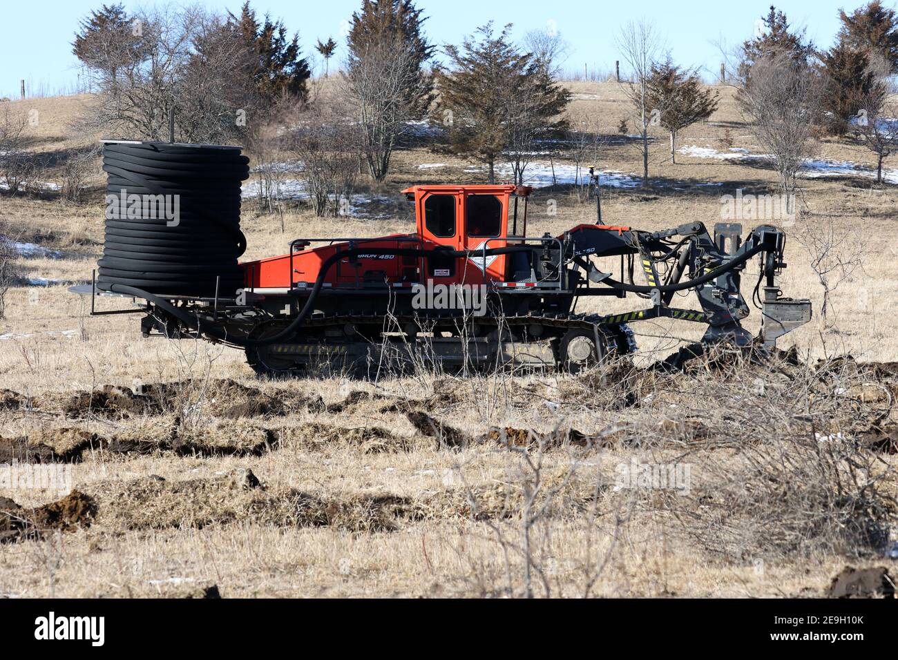 Installing Ditch drainage on farm Stock Photo - Alamy