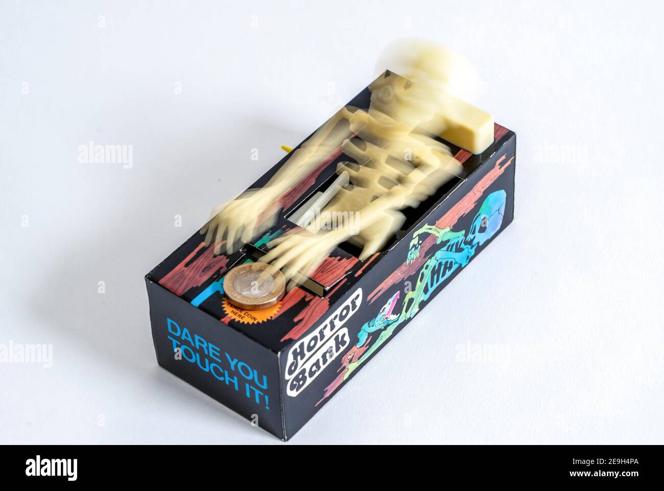 Vintage Horror Monster Wind Up Skelton Money Bank Stock Photo - Alamy