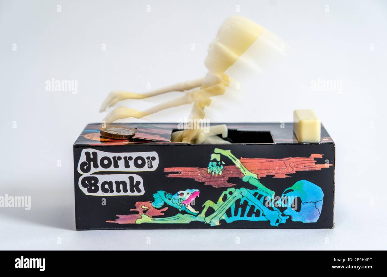 Vintage Horror Monster Wind Up Skelton Money Bank Stock Photo - Alamy