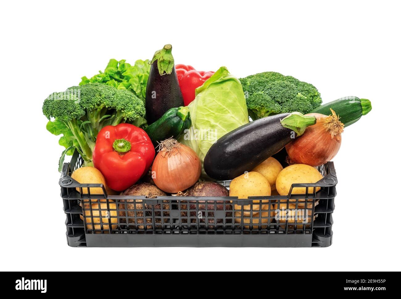 Colorful vegetable basket isolated and filled with broccoli, lettuce ...