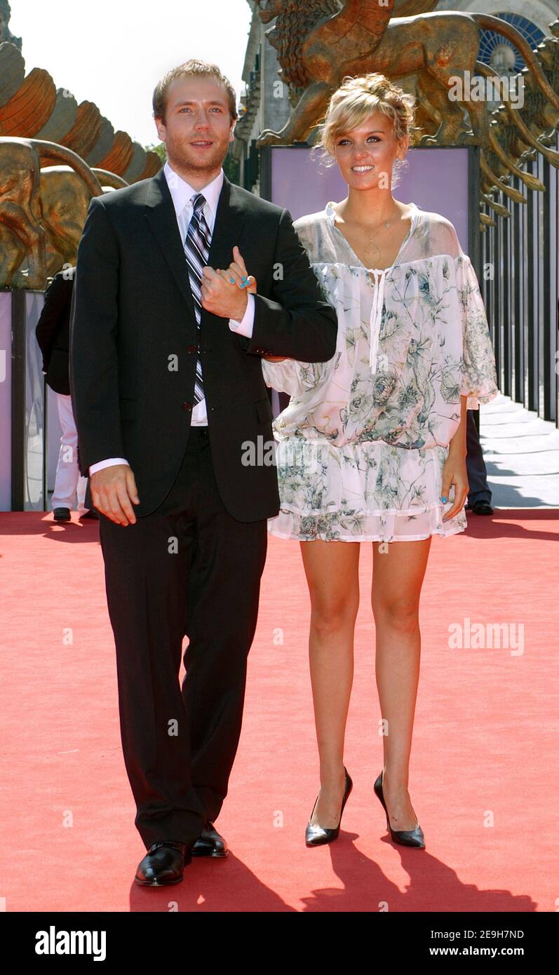 Cast member Mark Webber and his girlfriend arrive to the premiere of ...