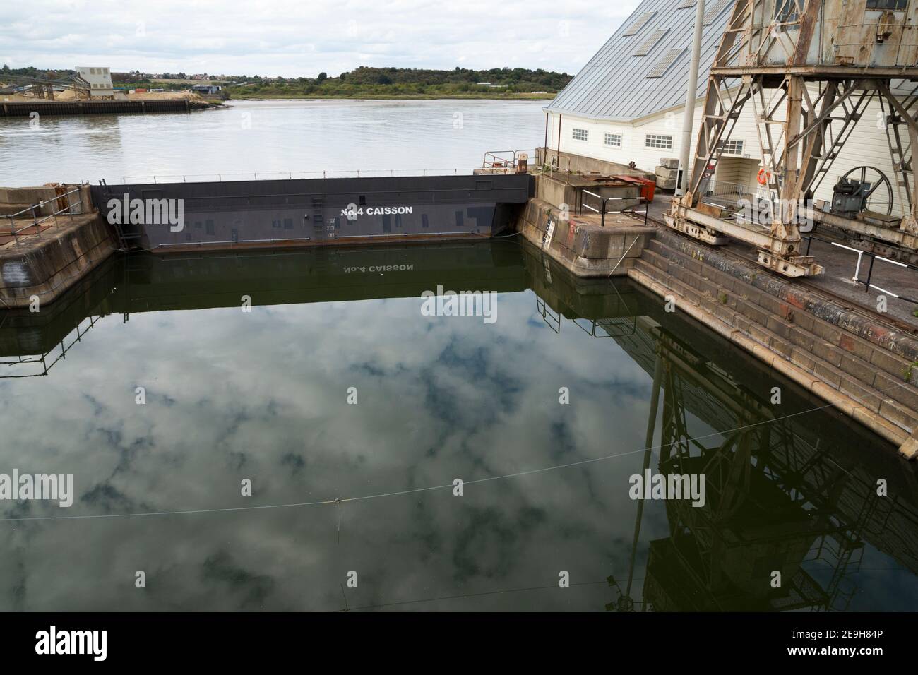 Water inside the No 4 Dry Dock (1840) and the reflection of a ...
