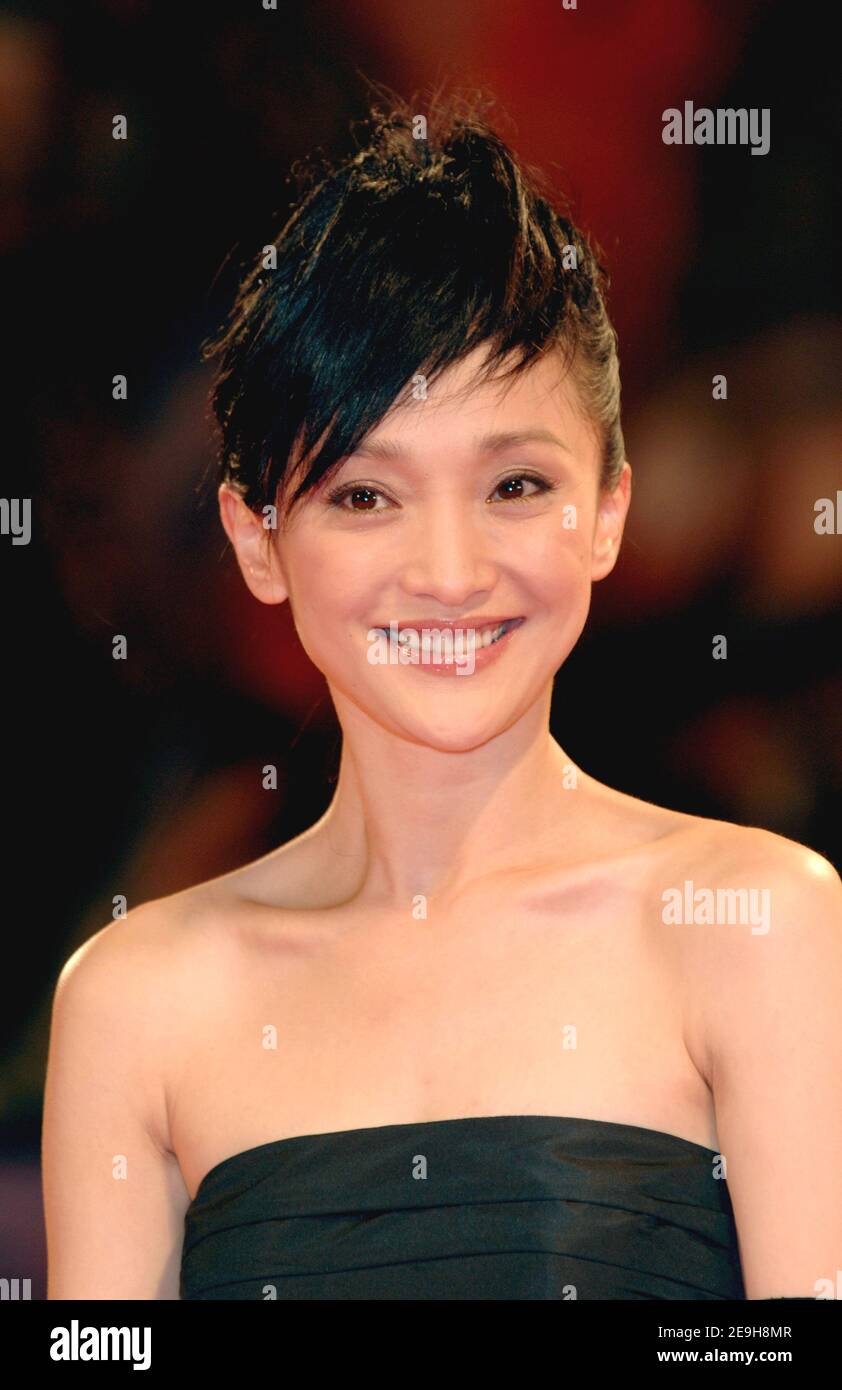 Chinese actress Zhou Xun poses for pictures as she arrives to the ...