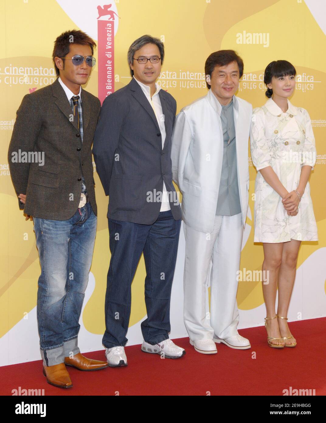 Director Benny Chan poses with his brother cast member Jacky Chan and ...