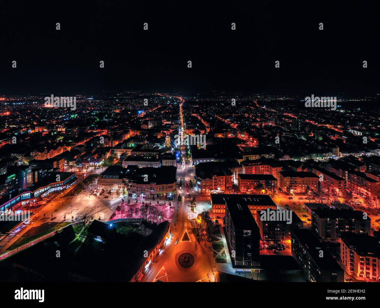 Cityscape of a modern city surrounded by the lights at night - perfect ...