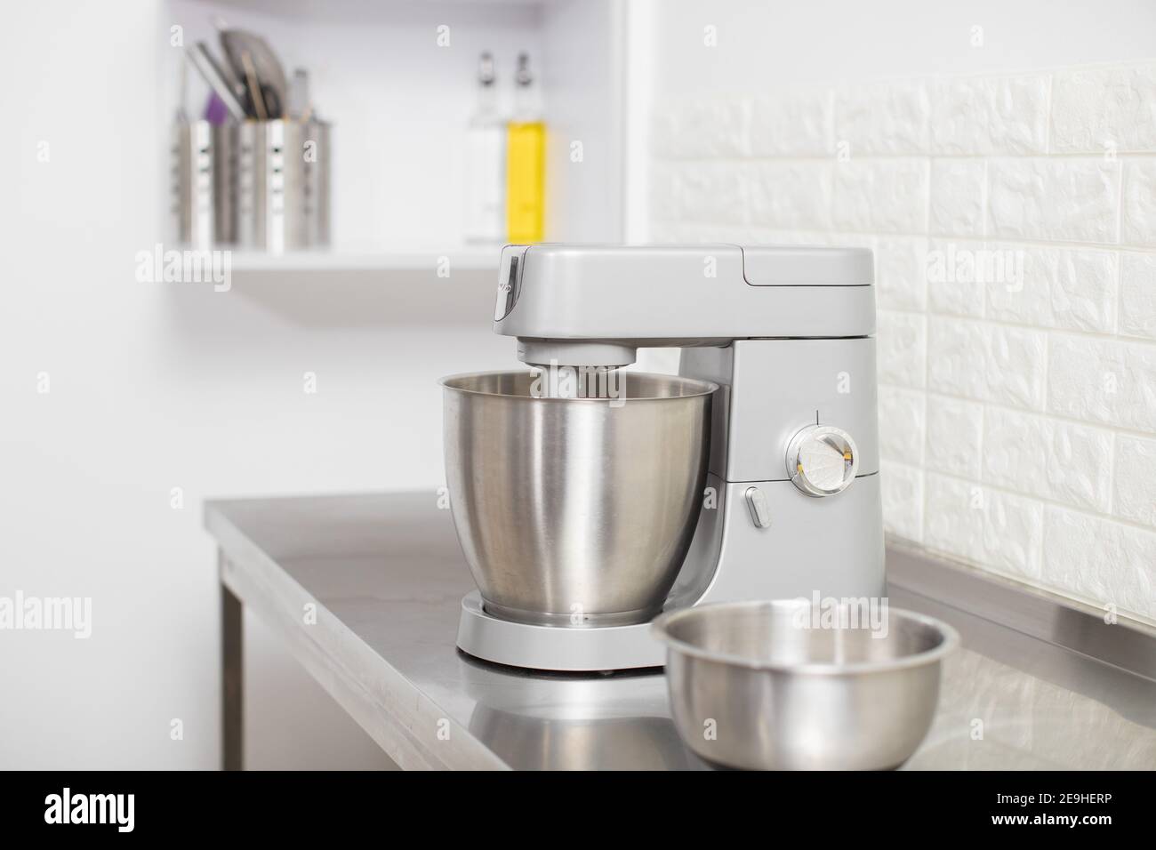 Small Electric Kitchen Appliances. Modern silver kitchen stand mixer in ...