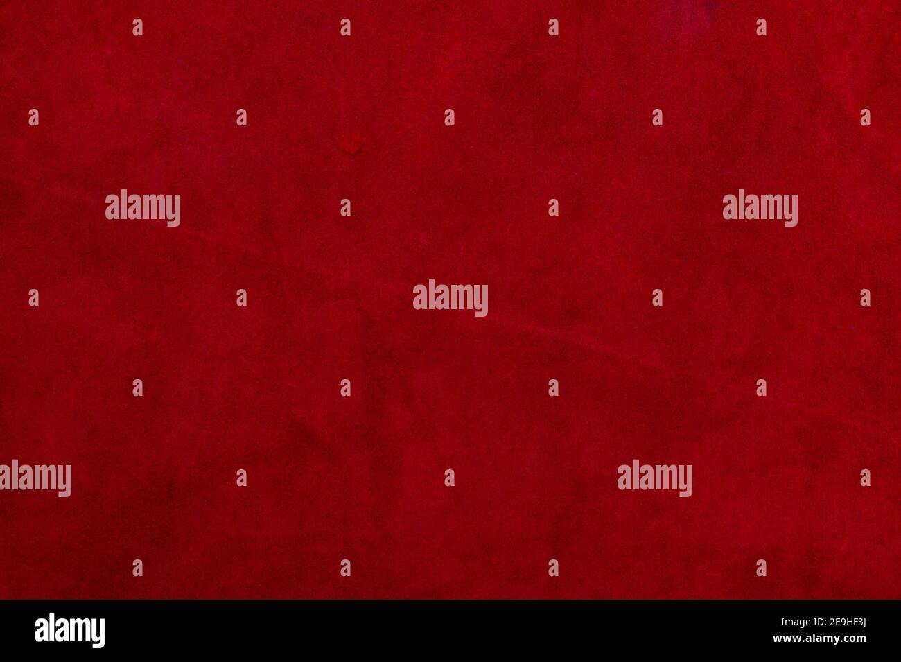 Velvet texture of seamless leather. Felt material macro. Red suede ...