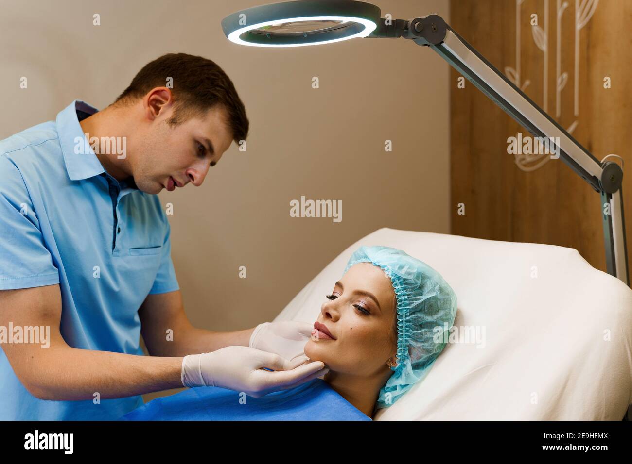 Consultation with plastic surgeon in medical center. Cosmetic ...