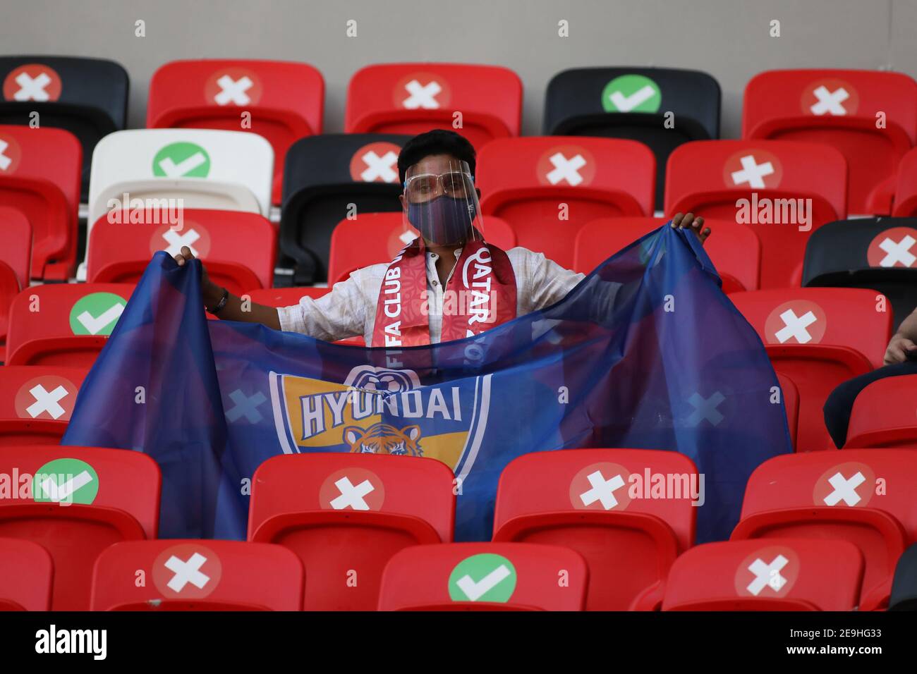 DOHA, QATAR - FEBRUARY 04: A fan with an Ulsan Hyundai flag at the ...