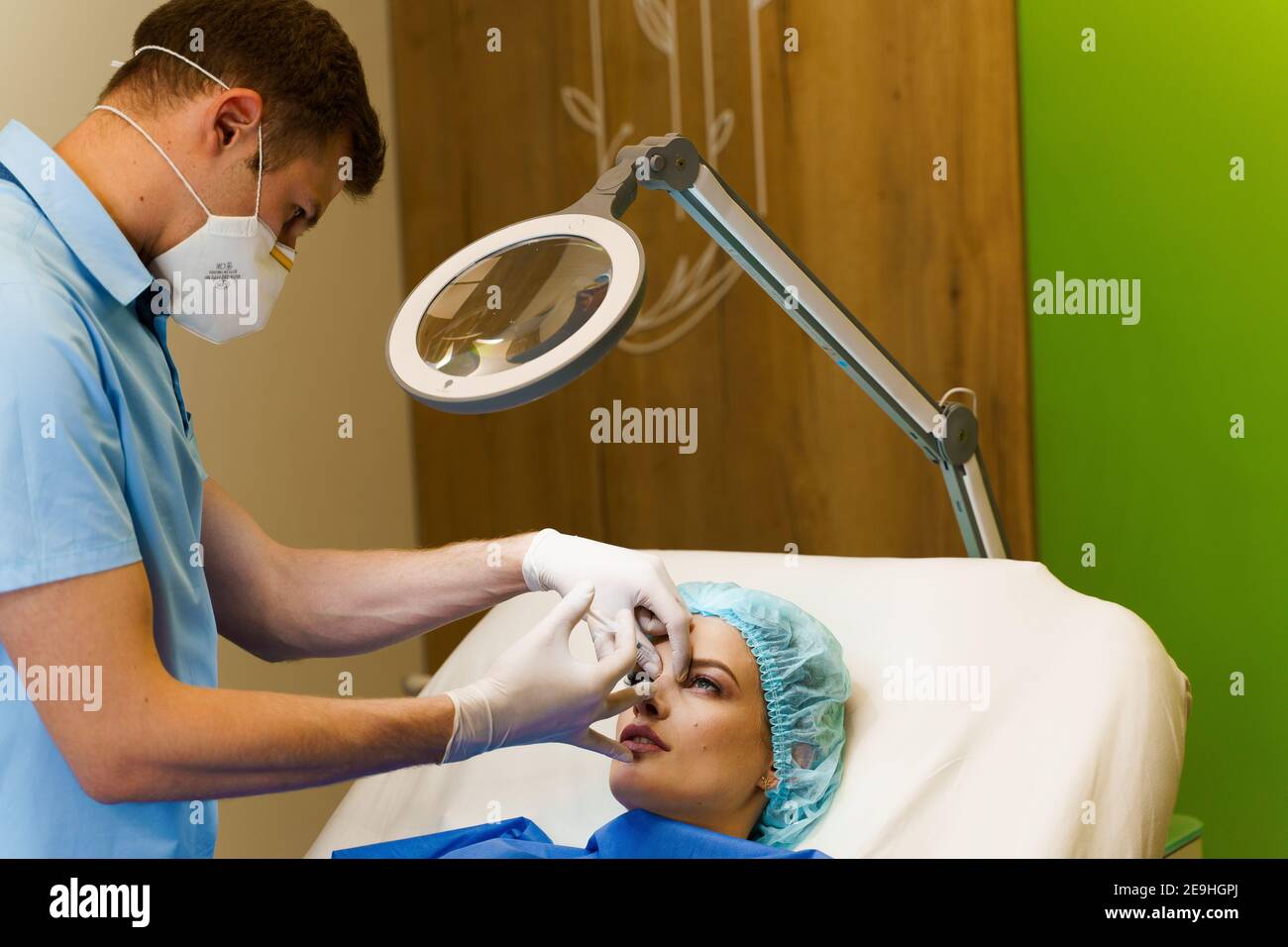 Injection in forehead contour plastic for correcting the volume and ...