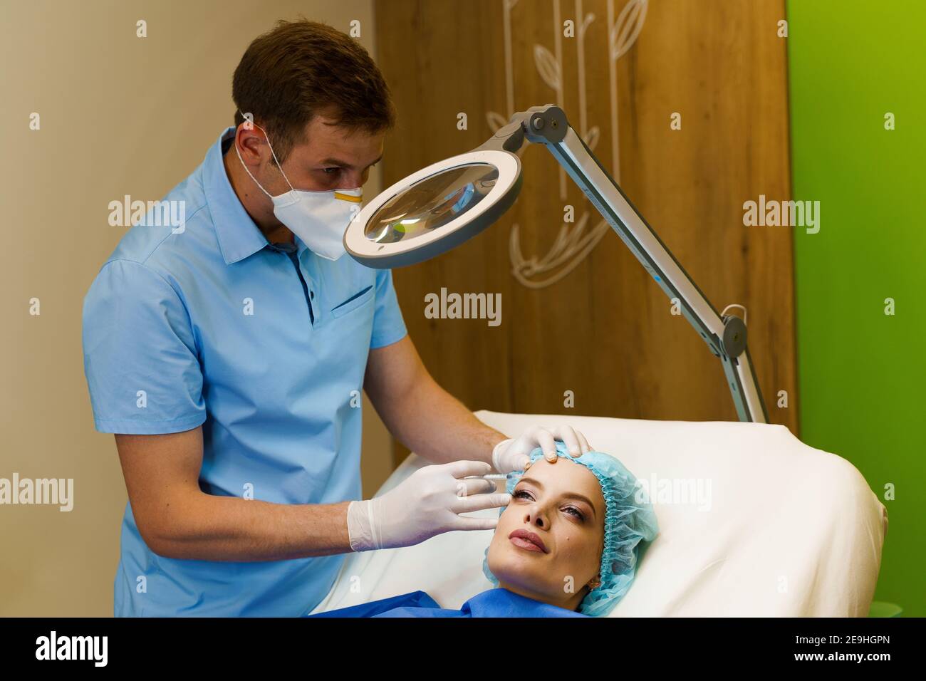 Injection in forehead contour plastic for correcting the volume and ...