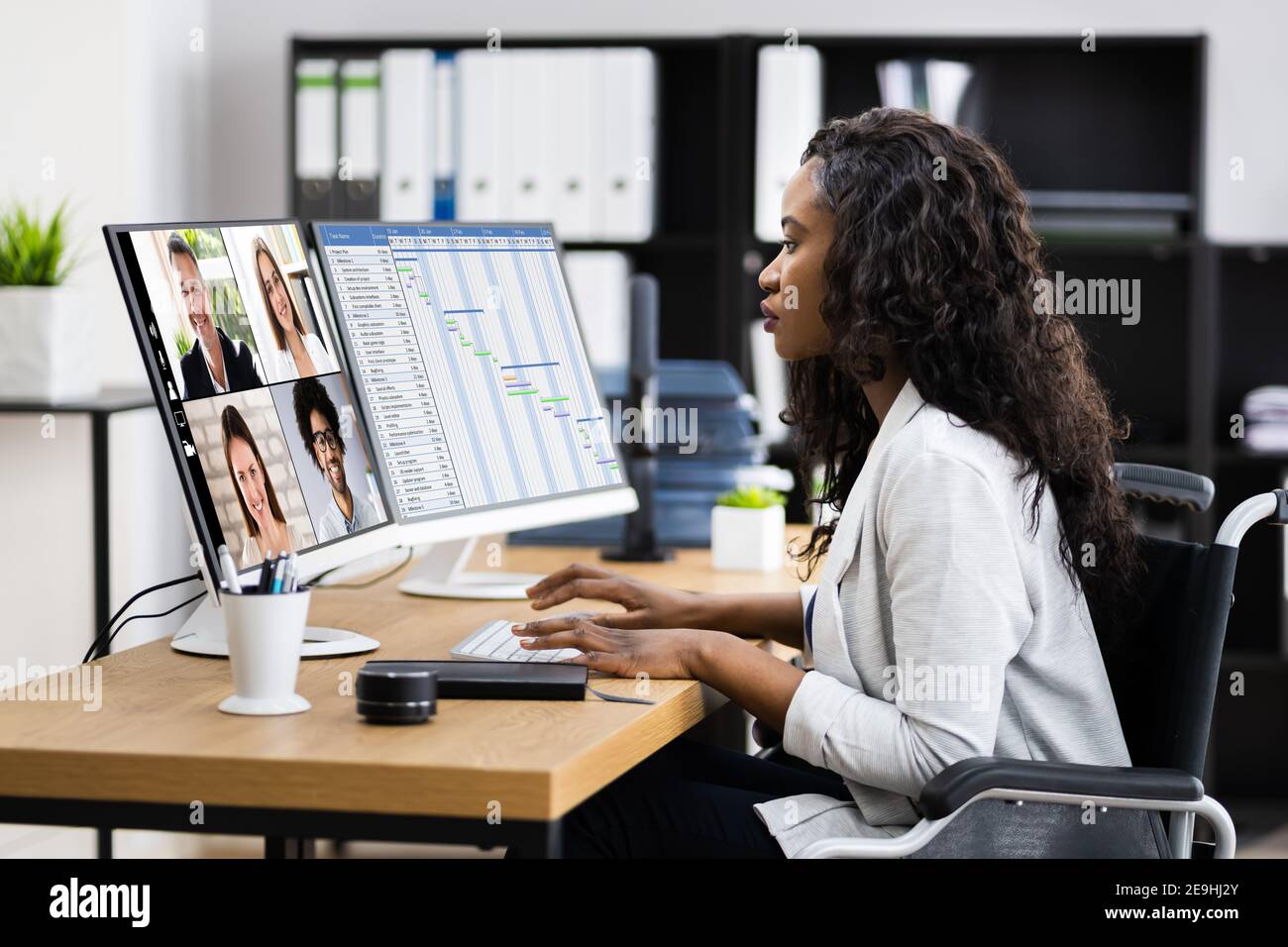 Online Virtual Learning Conference. Working On Multiple Screens Stock ...