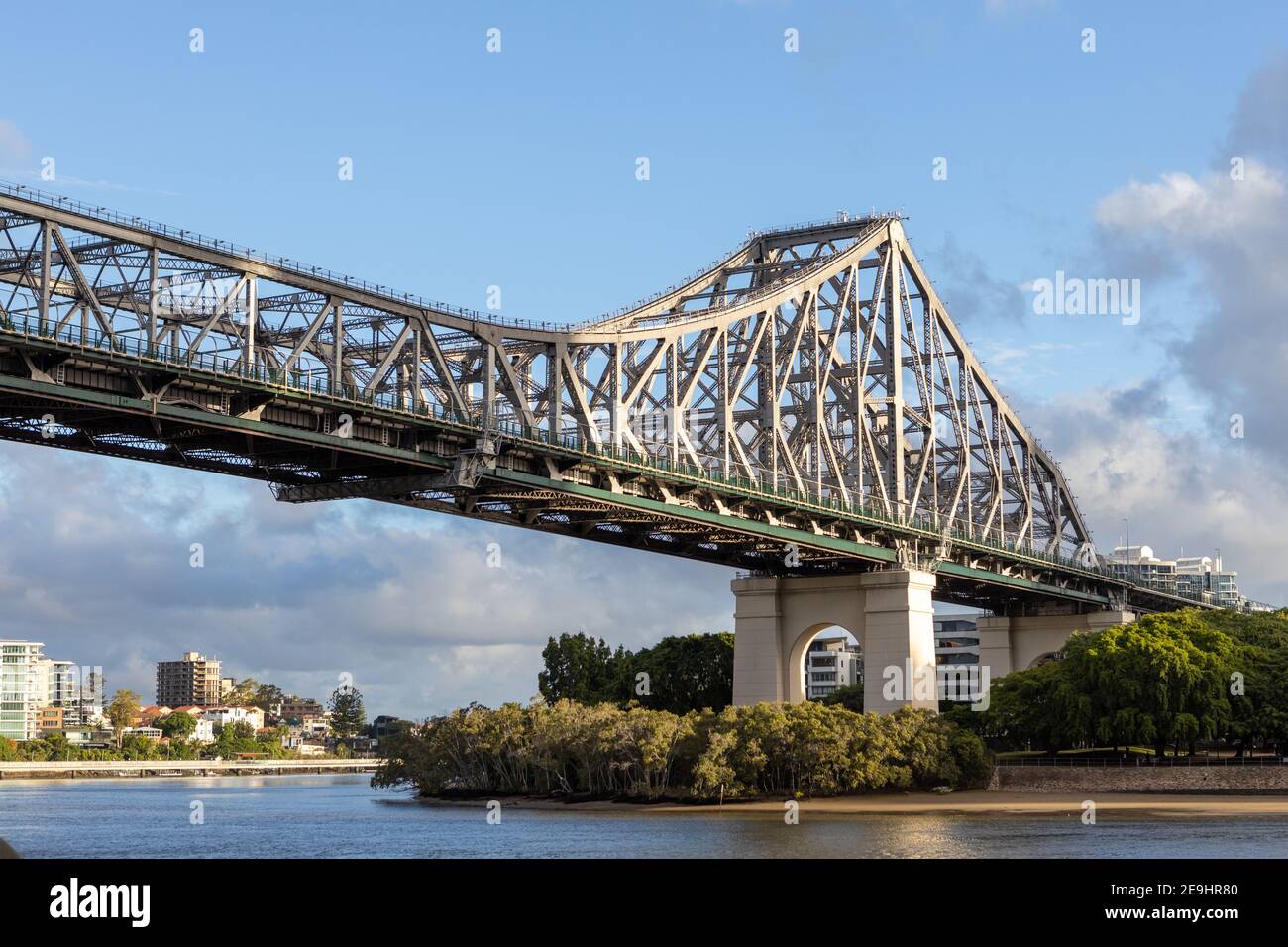 The Story bridge crossing over the Brisbane river on a sunny day in ...